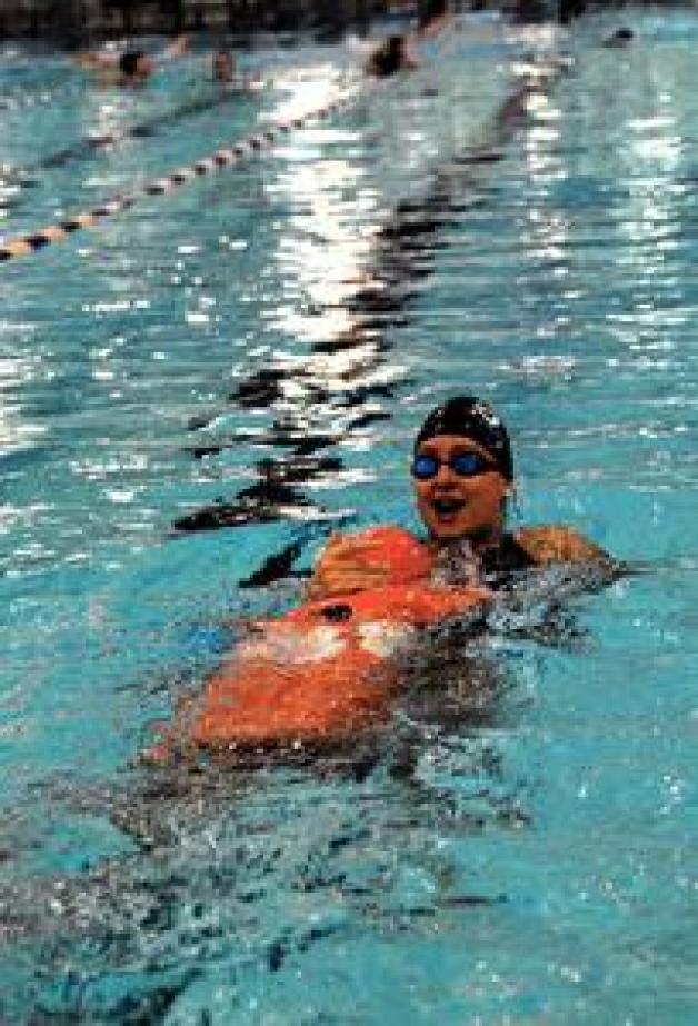 Schwimmer zwischen Rennen und Live-Musik