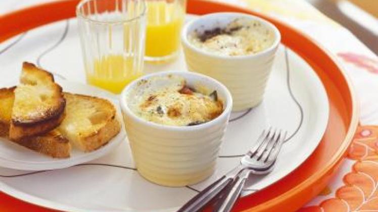 Gebratene Eier mit Spinat und Parmesan